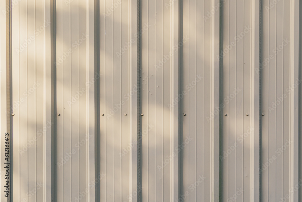 Cream metal siding wall with shadows background texture Stock Photo ...