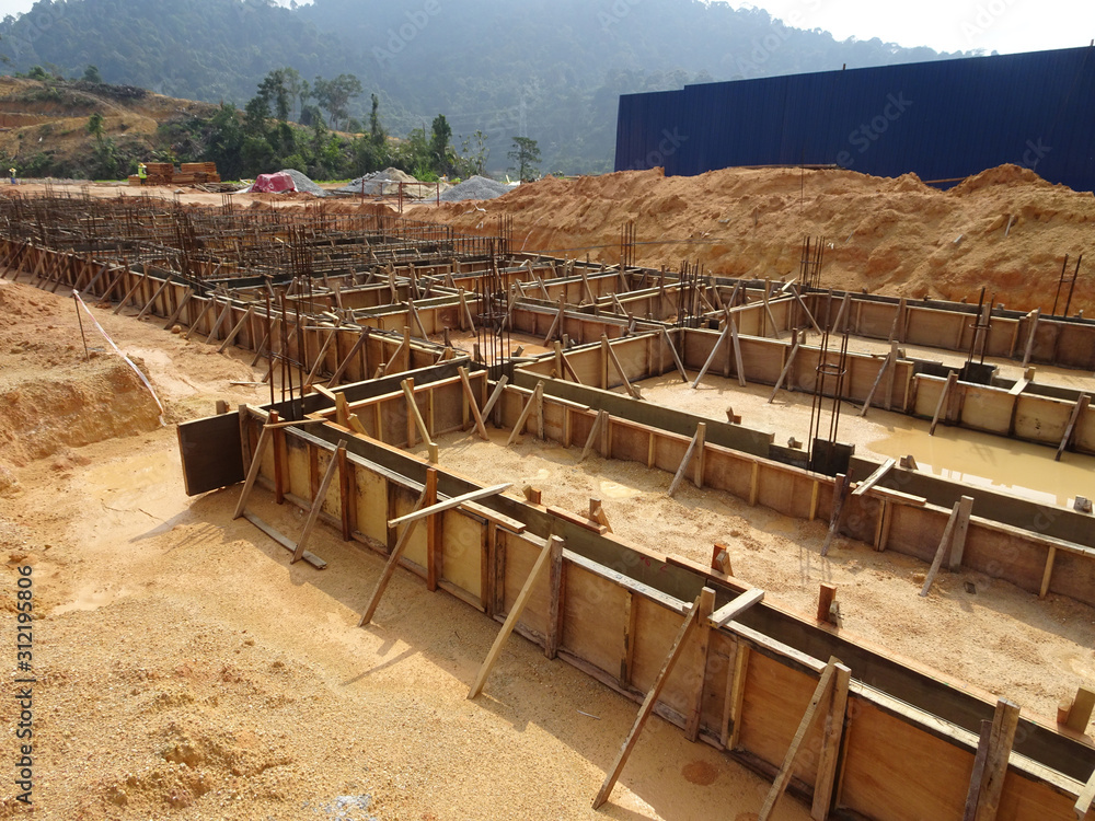 Building ground beam under construction using temporary timber plywood ...