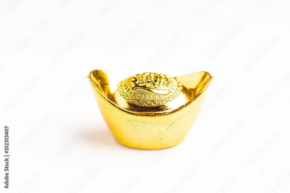 Chinese Gold Bar isolated against white. The words on the gold bar is ...