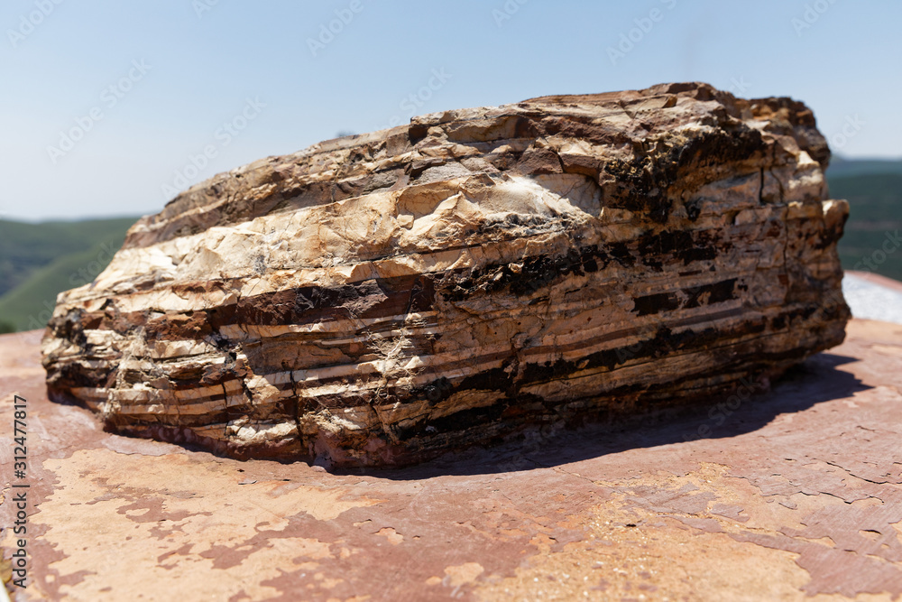 Foto de Stock Banded chert is a layered mix of volcanic ash, chert and ...