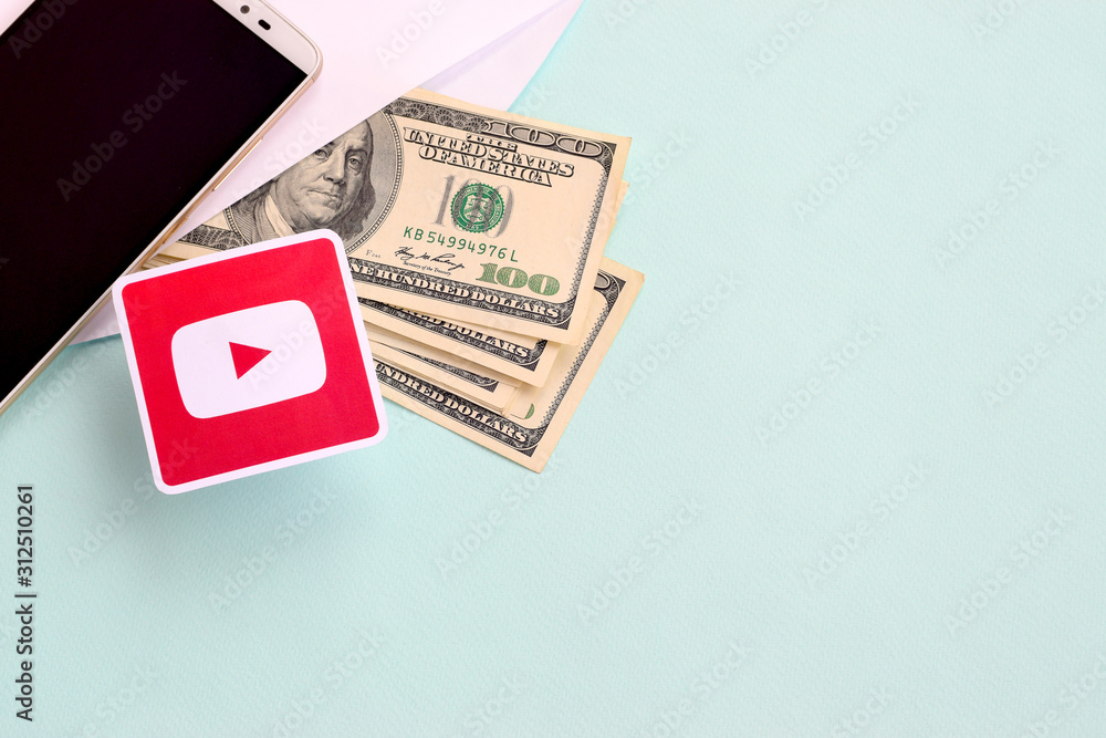 Youtube paper logo lies with envelope full of dollar bills and ...