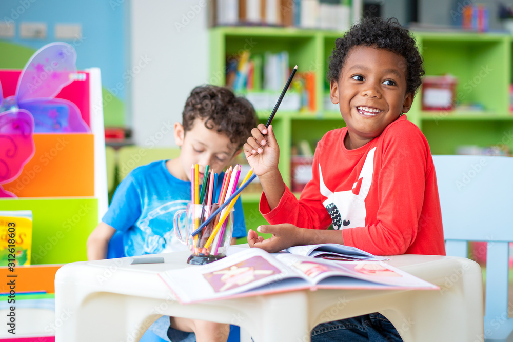Portrait of mixed race student kids studying in international ...