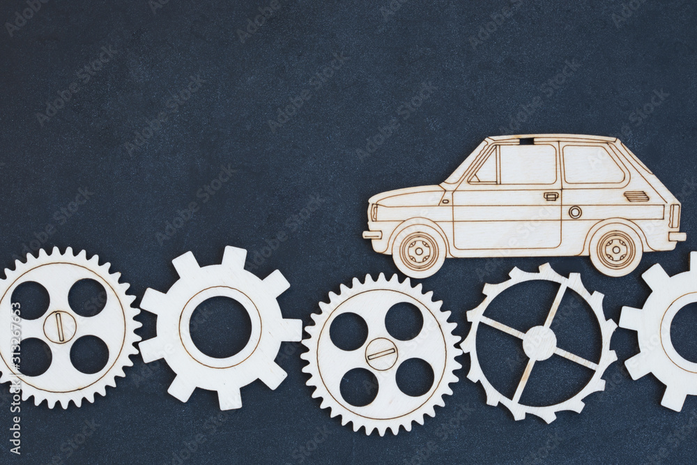 Car running on gears suggesting innovation of new technology in ...