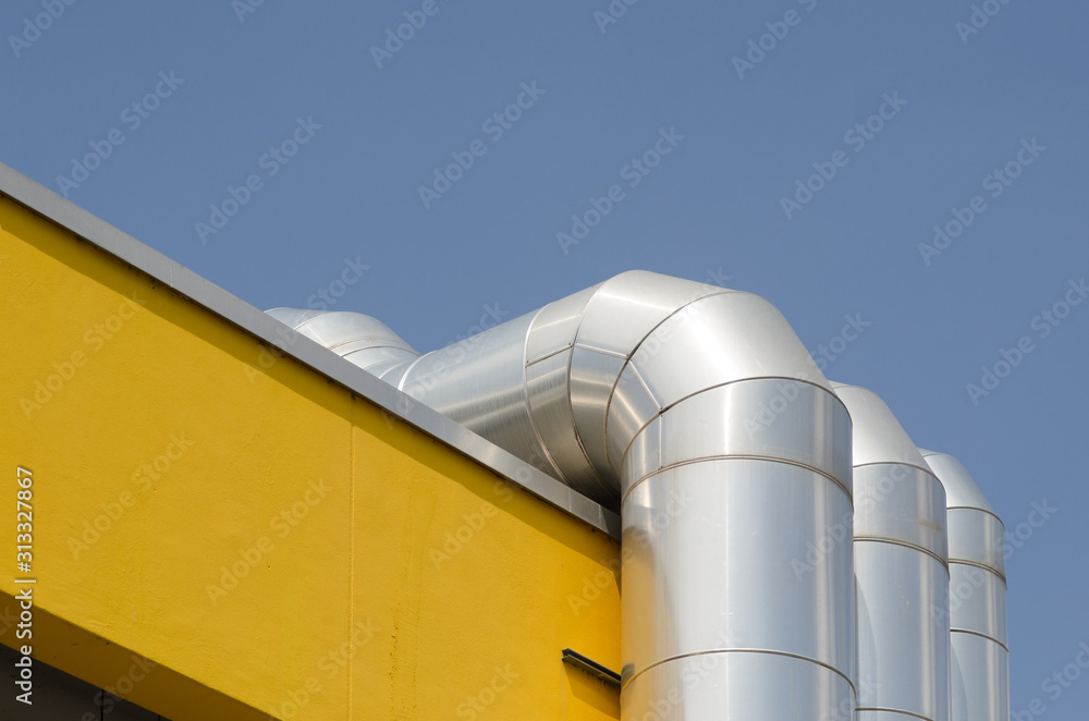 heating system or utility lines on a building. The pipes of the service ...