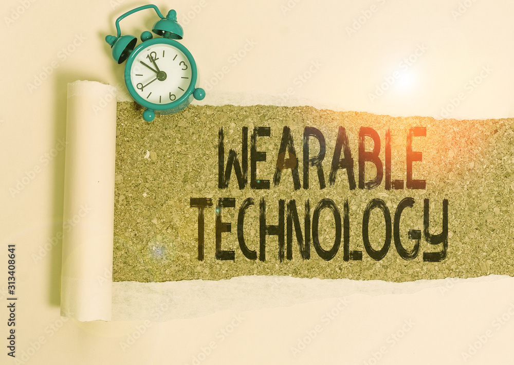 Writing note showing Wearable Technology. Business concept for ...