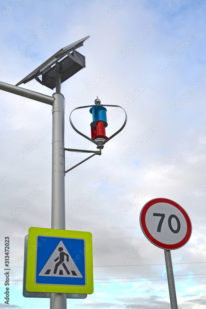Traffic signs, wind generator and solar panel. Crosswalk Stock Photo ...