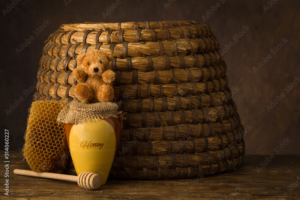 Teddy bear and honeypot with beehive Stock Photo | Adobe Stock