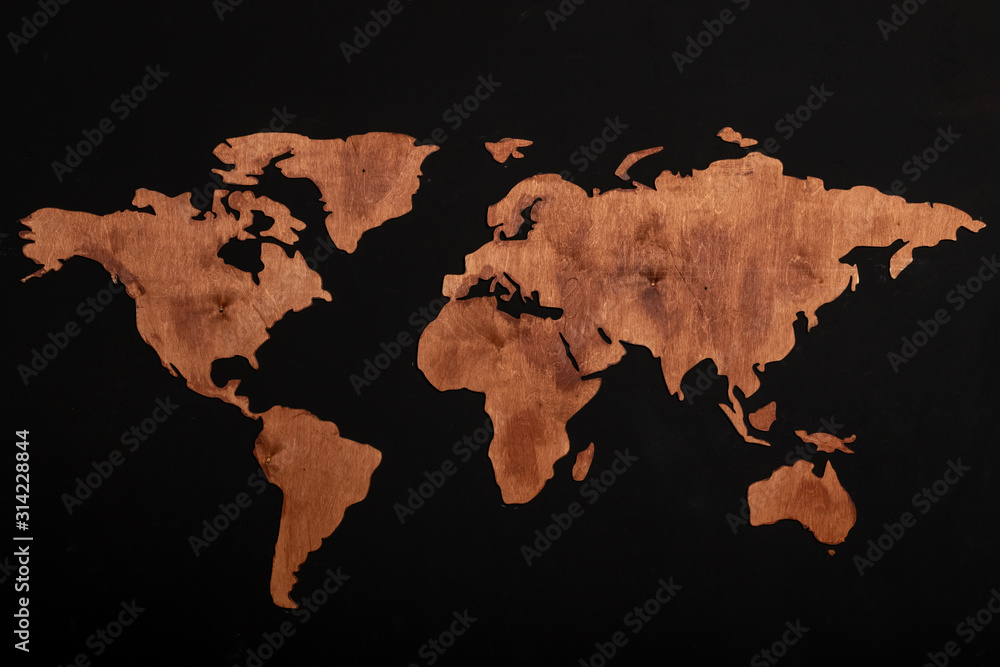 World map of earth showing continents on a wood tree ring textured ...