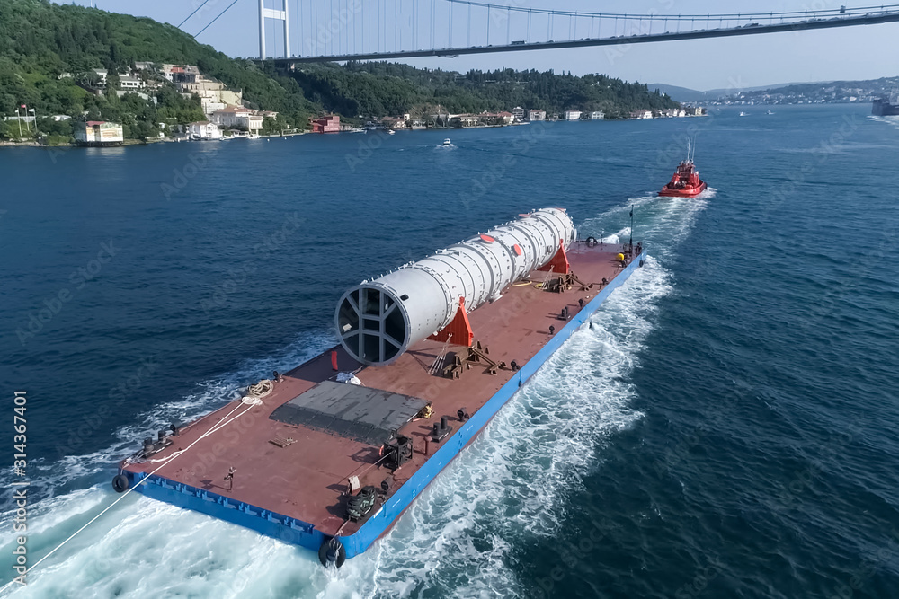 Oversized cargo transportation along the river, a distillation column ...