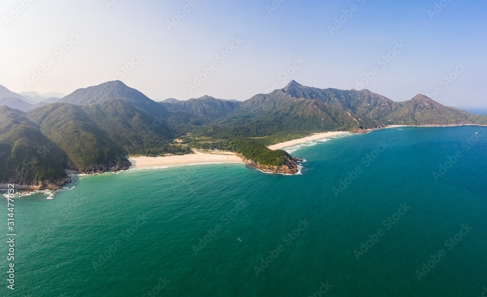 Aerial view of the stunning Sai Kung peninsula with remote beaches and the sharp peak in Hong ...