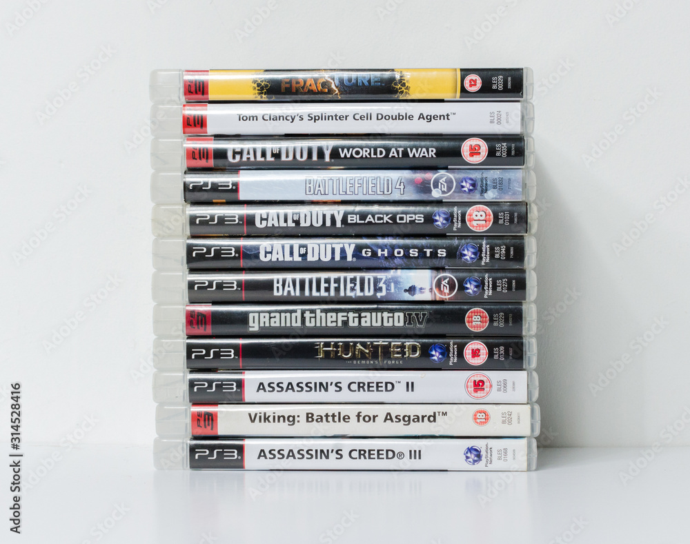 london, england, 08/05/2018 A large pile stack of used playstation 3 ...