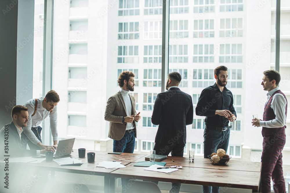 business men coworking in office, business crew consisted of young men ...