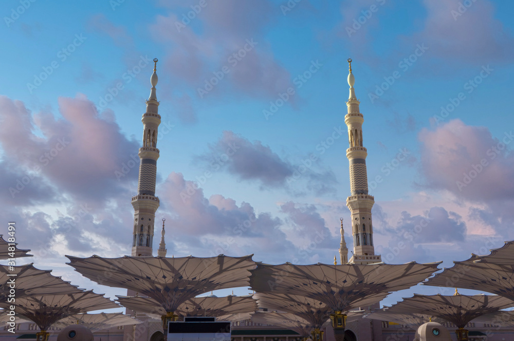 Exterior view of minarets and giant canopy at the entrance of Al Nabawi ...