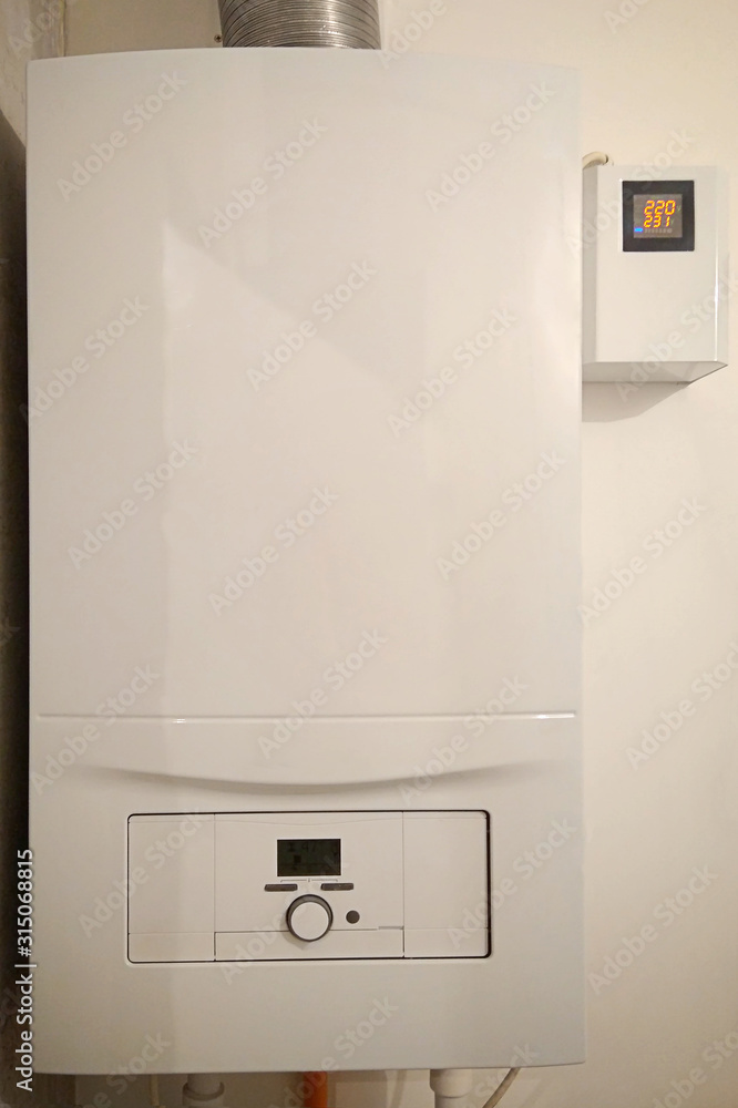 Photo Stock Modern home gas fired boiler. Heating a house concept ...