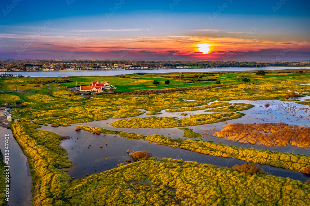 Bull Island aerial view at sunset, revealing marram-grass-anchored ...