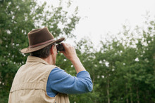 Man Watching Bird Free Stock Photo - Public Domain Pictures