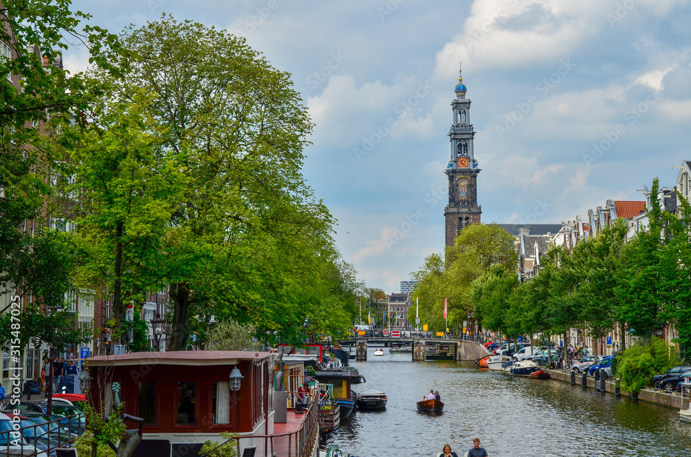 Amsterdam, Holland, August 2019. From a bridge you can see the bell ...