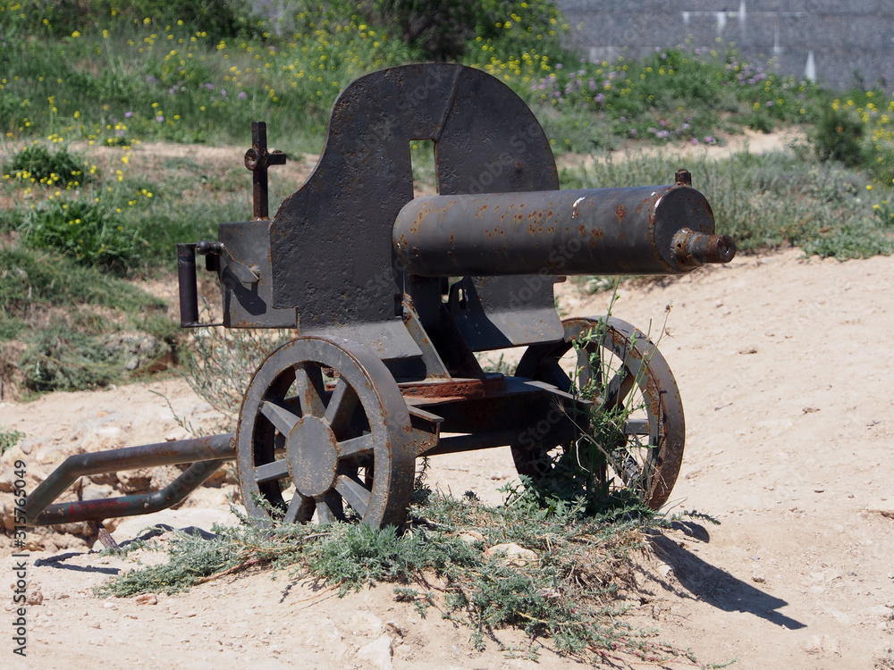 Maxim machine gun on the breastwork of the trench, close-up. Weapons of ...