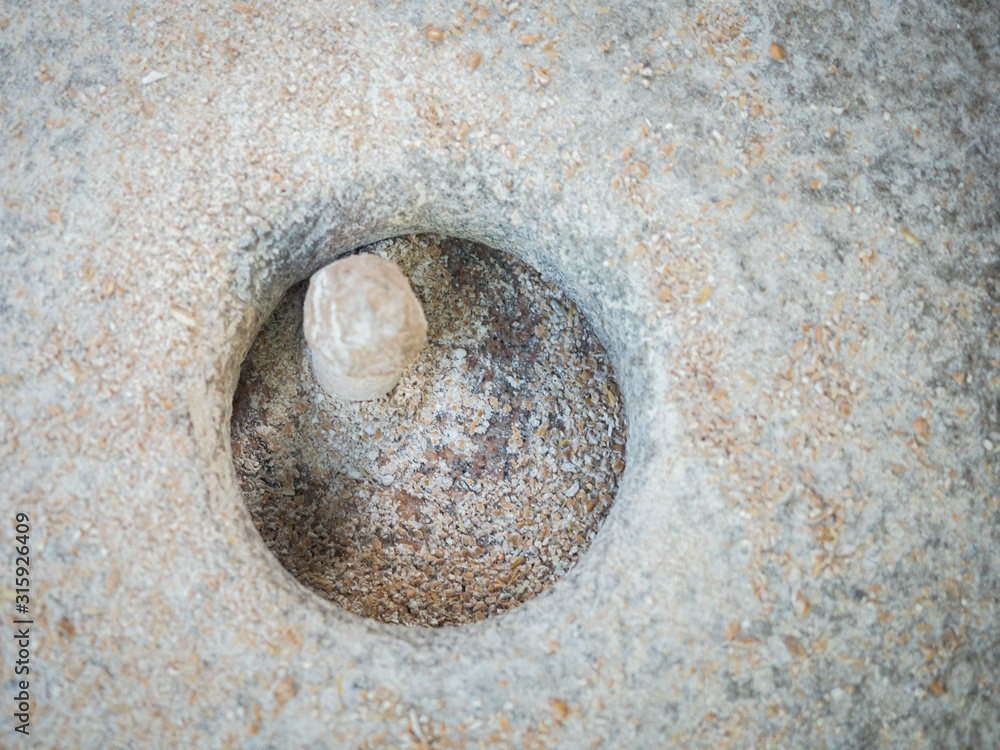 Rotary discoid mill stone for hand-grinding a grain into flour ...