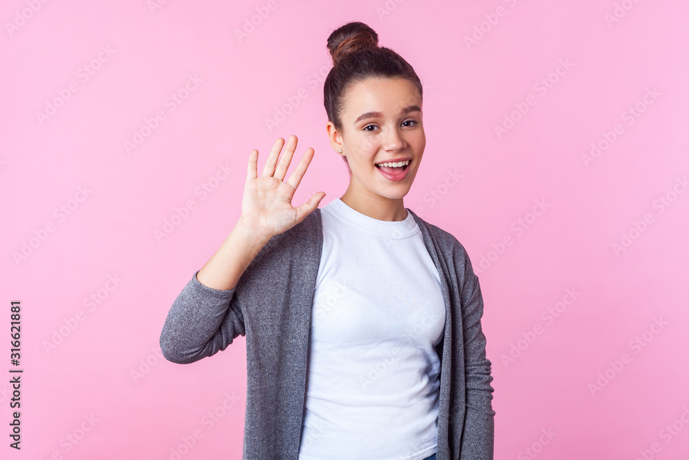 Sweet hello from lovely girl. Portrait of friendly brunette teenager ...