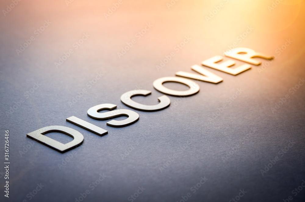 Word discover written with white solid letters Stock Photo | Adobe Stock