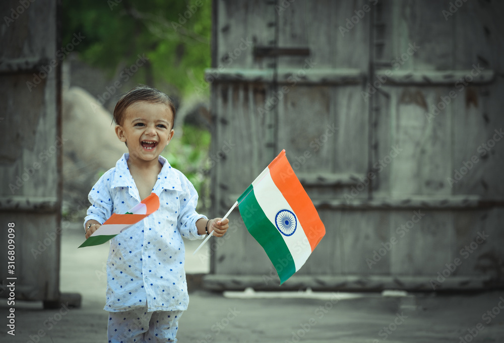 beautiful view of Indian kid with Indian flag in his hand Stock Photo ...
