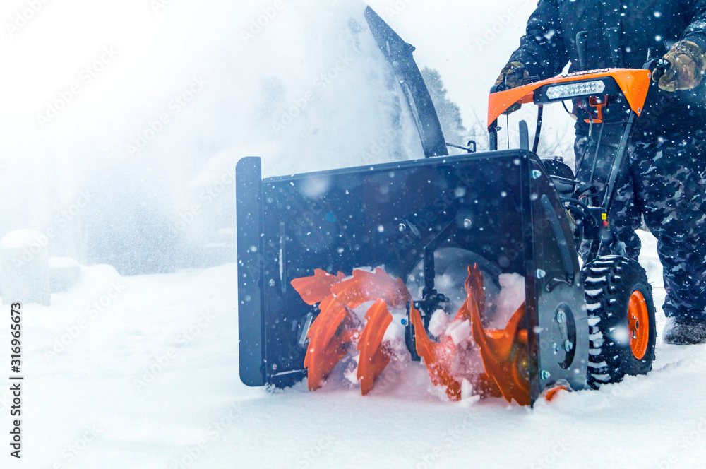 manual snow plow, snow removal after a snowfall, selective focusing ...