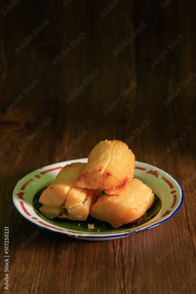 Deep fried cassava root. Brazilian Mandioca Frita (deep fried cassava ...