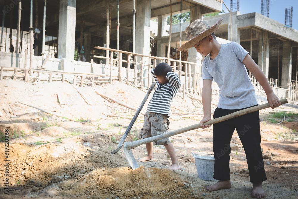 Concept of poverty and child labor, Children who are working on ...