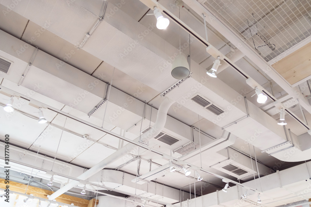 Ventilation ducts system painted in white composition of fire ...