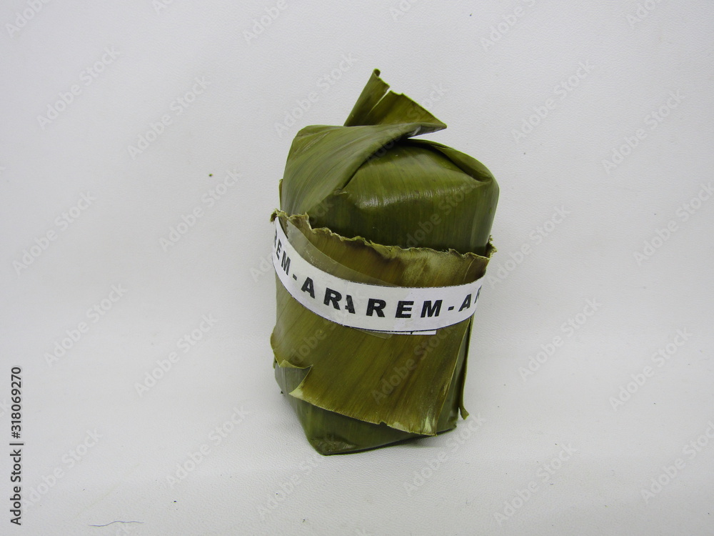 eat wrapped Kue Arem Bongko Mento Mentuk Lemper or rice cake.indonesian ...