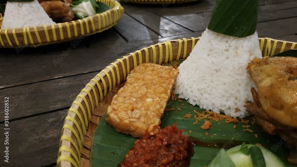 Tumpeng rice aka Nasi Tumpeng is an authentic or traditional Indonesian ...