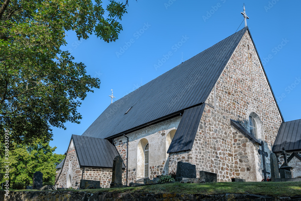 Medieval greystone Pargas kyrka (Pargas Church) on the church hill in ...