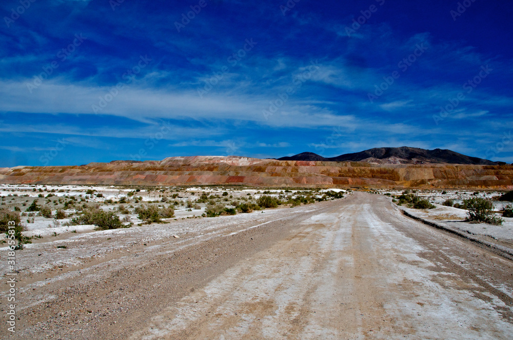 Very wide dirt roads lead away from mine to accommodate large mining ...