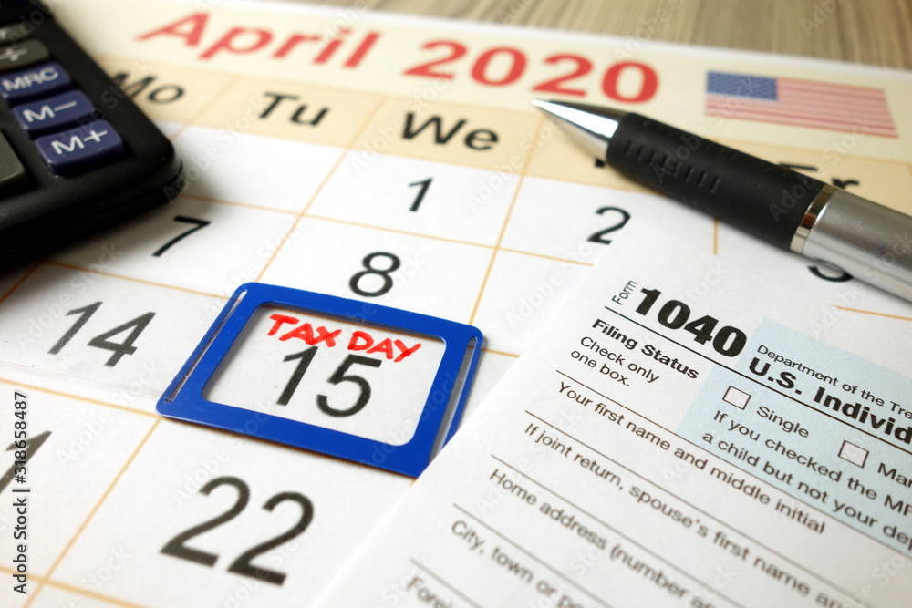 Monthly calendar showing date April 15th 2020 marked as tax day with ...
