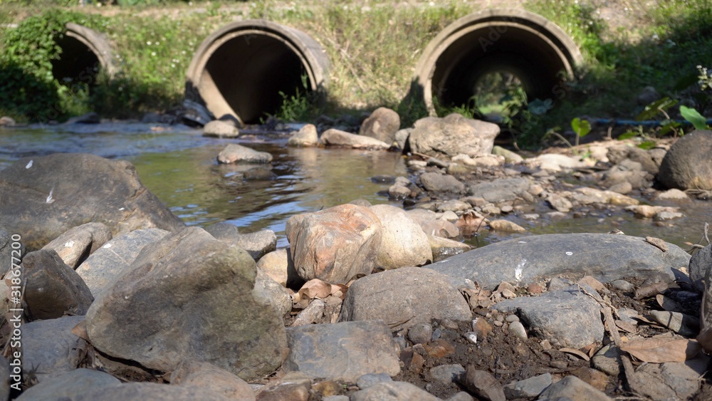 Reinforced concrete box culverts under the road with waterfall. Box ...