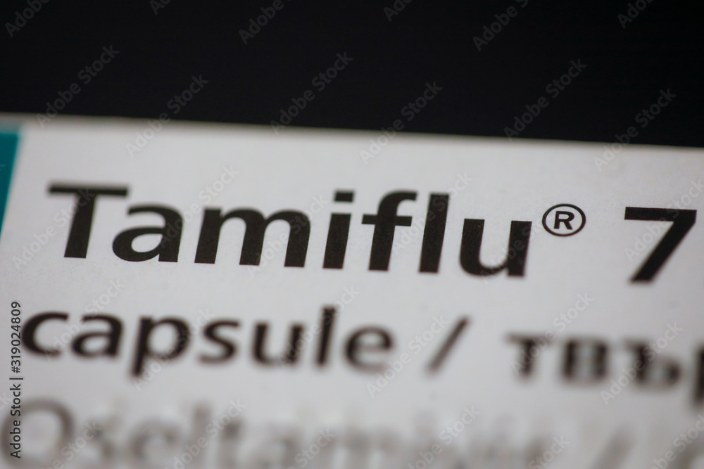 Close up image with a Tamiflu package. Tamiflu is an antiviral ...