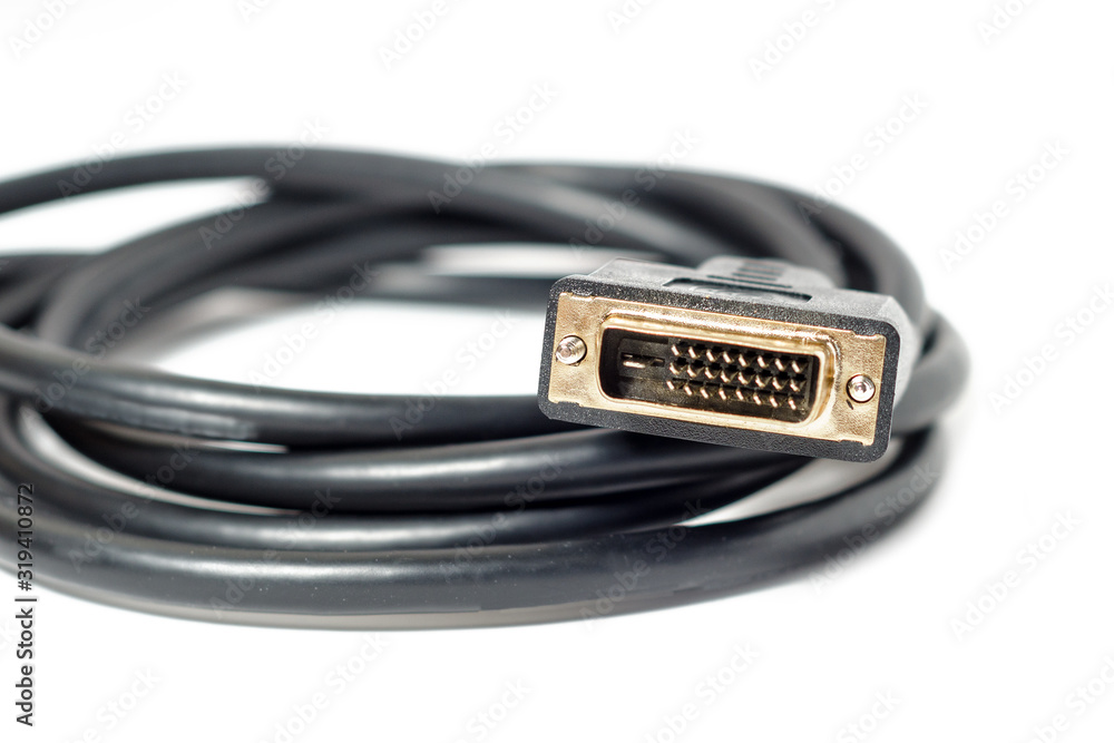 Black DVI cable with gold-plated pins on an isolated white background ...