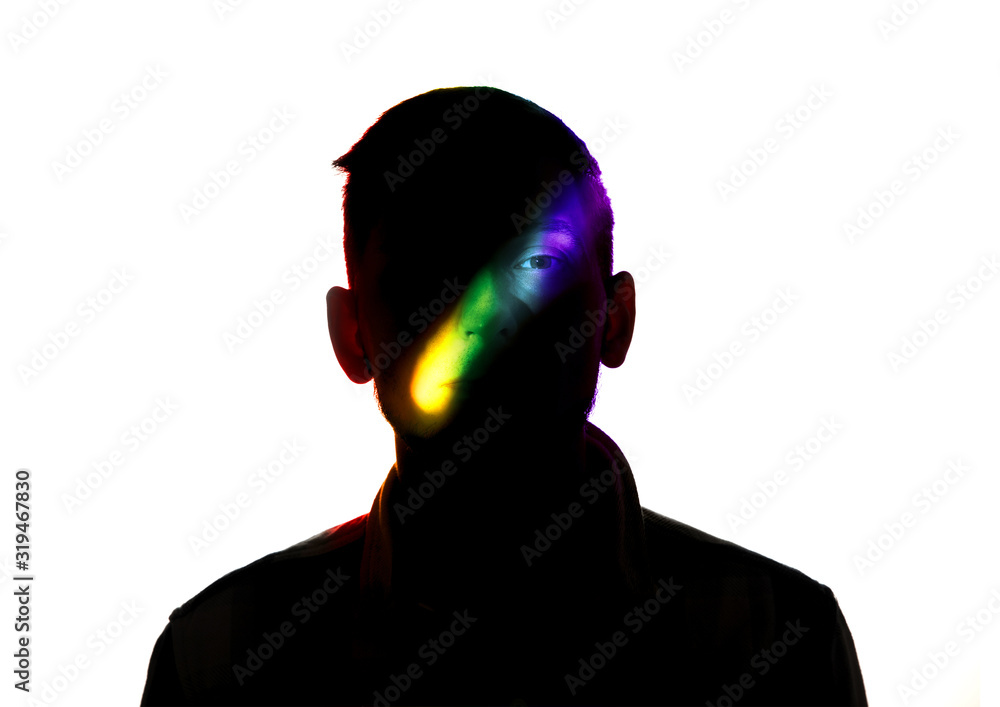 Brave. Dramatic portrait of a man in the dark on white studio ...