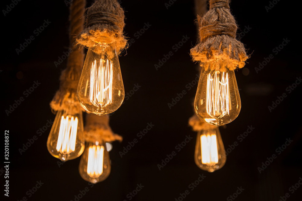 rustic bulb aka edison bulb with rope design Stock Photo | Adobe Stock