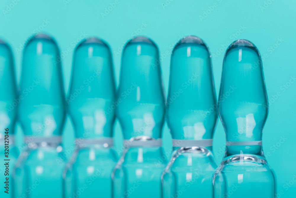 Glass medical ampoule vial for injection. Medicine is liquid sodium ...