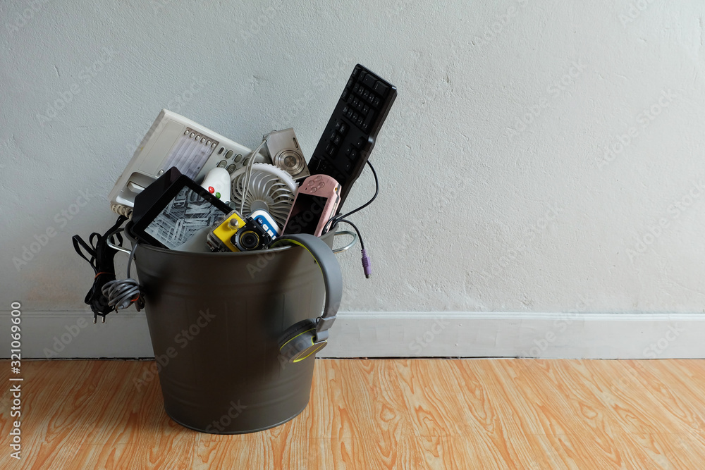 Electronic Waste broken or damage In Recycle bin in the room with white ...