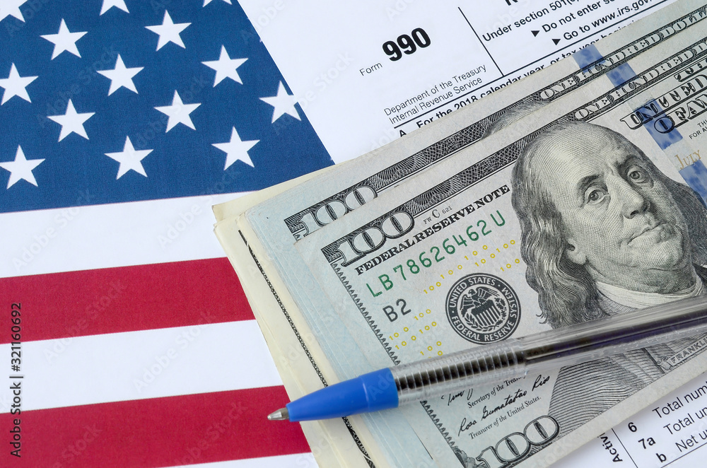 Form 990 Return of organization exempt from income tax and blue pen ...