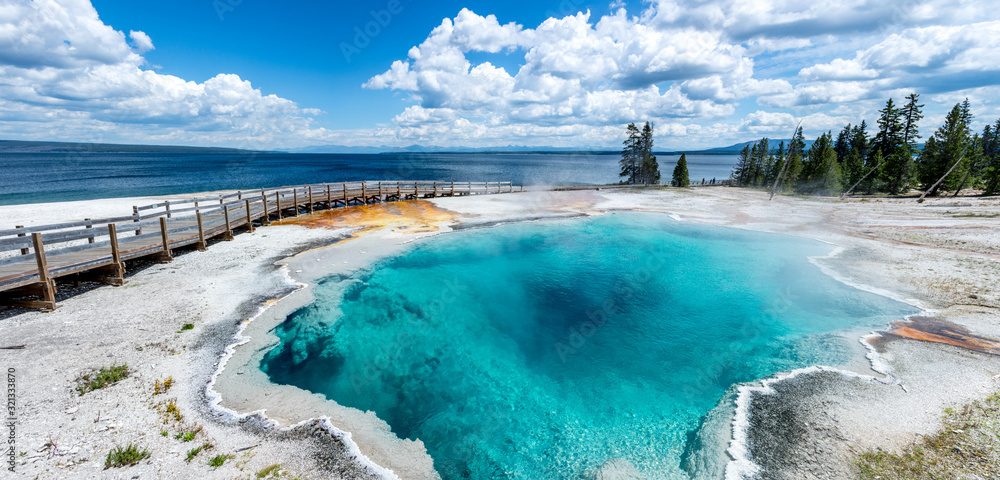 panoramic picture of blue water hot spring (black pool) in yellowstone ...