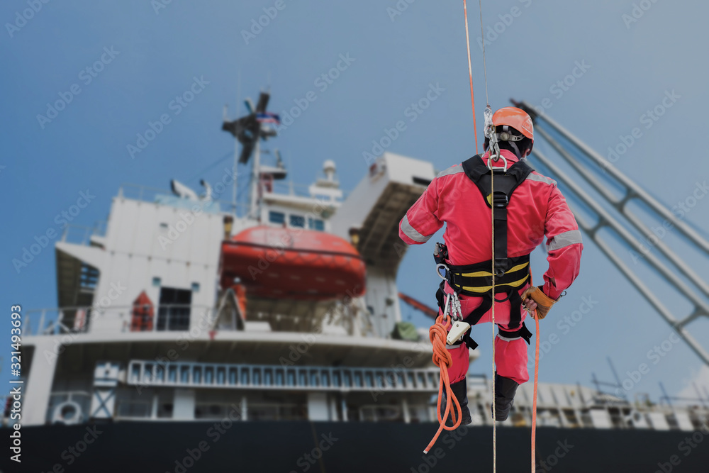 Safety man worker Abseiling, rope access sprinkle from structure steel ...