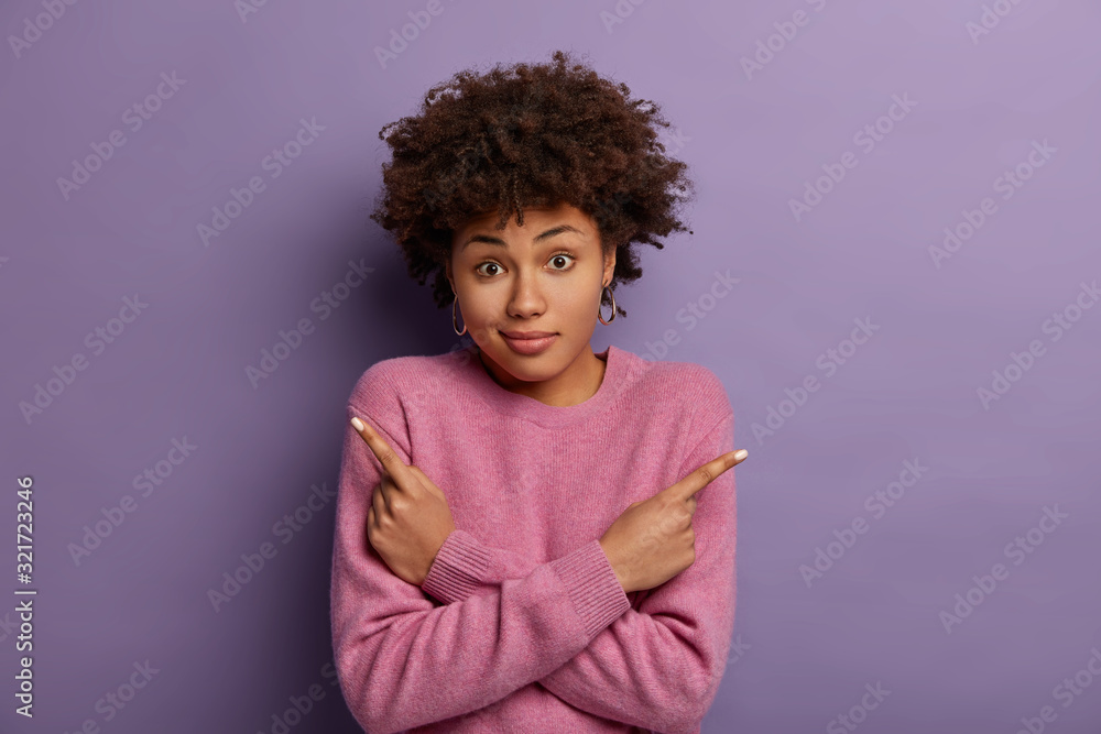 Two variants are possible. Hesitant clueless Afro American woman ...