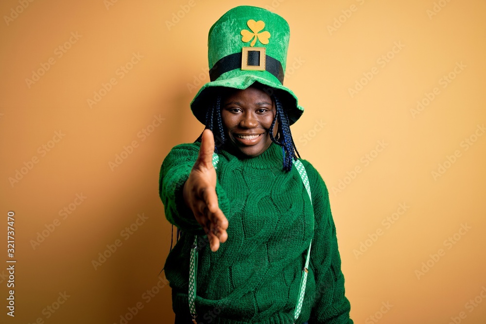 Plus size african american woman with braids wearing green hat with ...