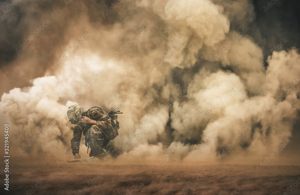 Military soldier making contact with Command Center between smoke in ...
