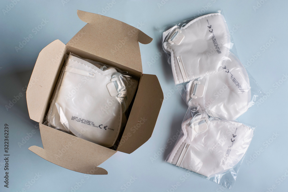 Box full of medical face dust masks, with disposable FFP3 respirators ...