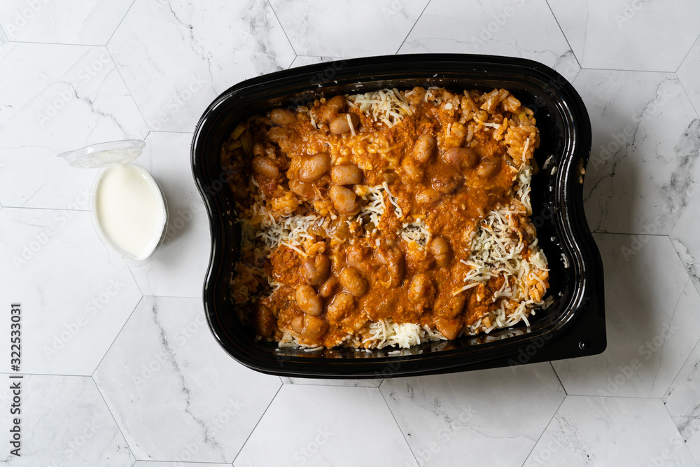Take Away Mexican Food Rice with Kidney Bean, Sour Cream, Grated ...